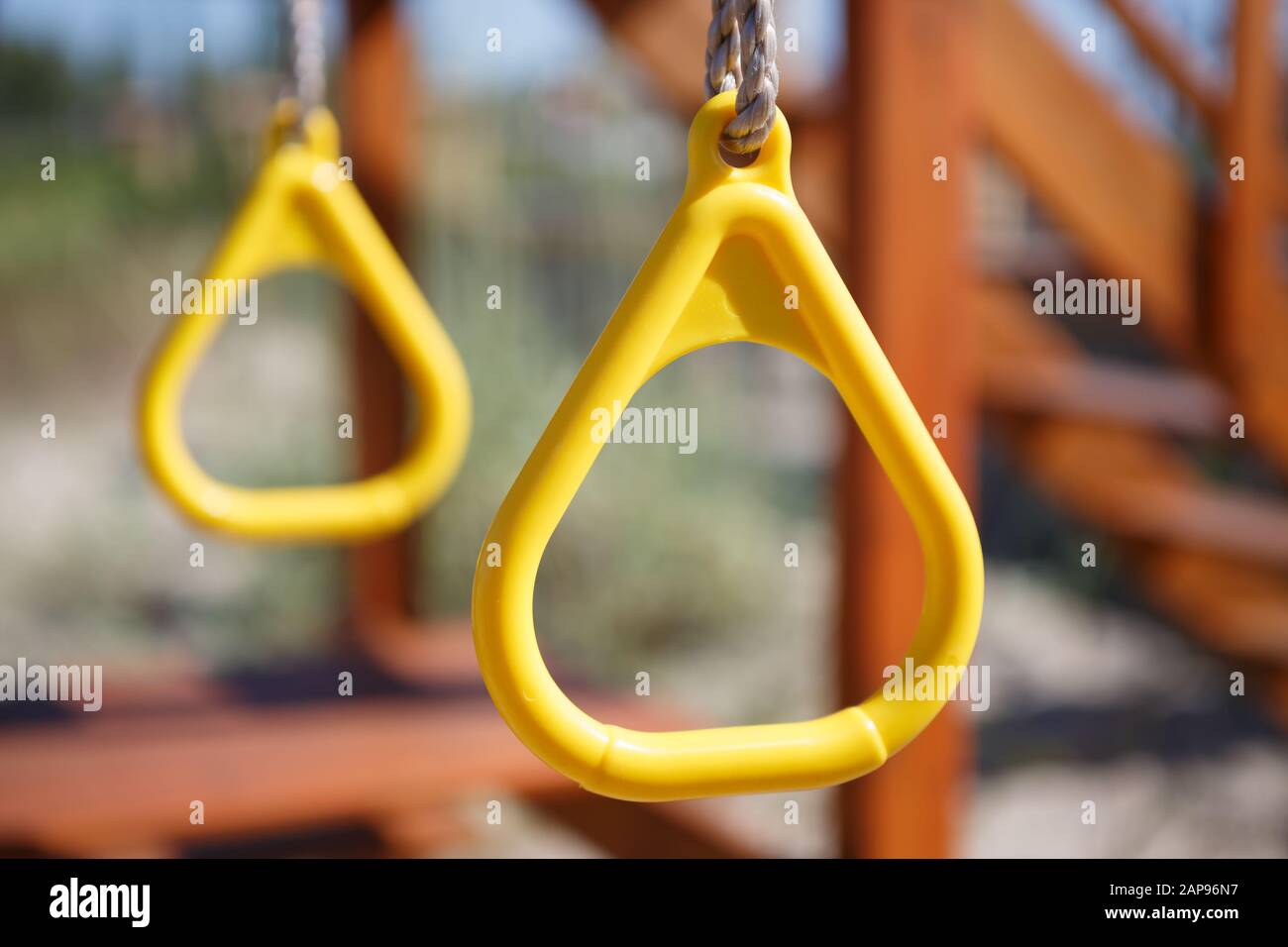 Yellow plastic rings on playground.Children play ground facility ...