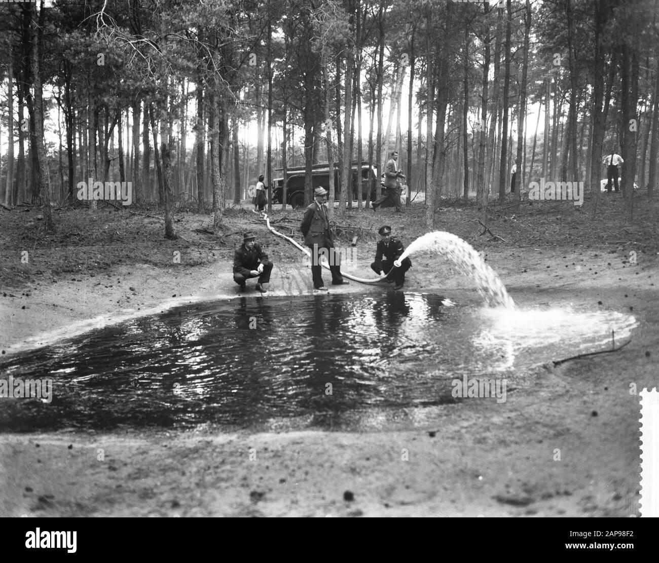 Fire brigade brings water hi-res stock photography and images - Alamy