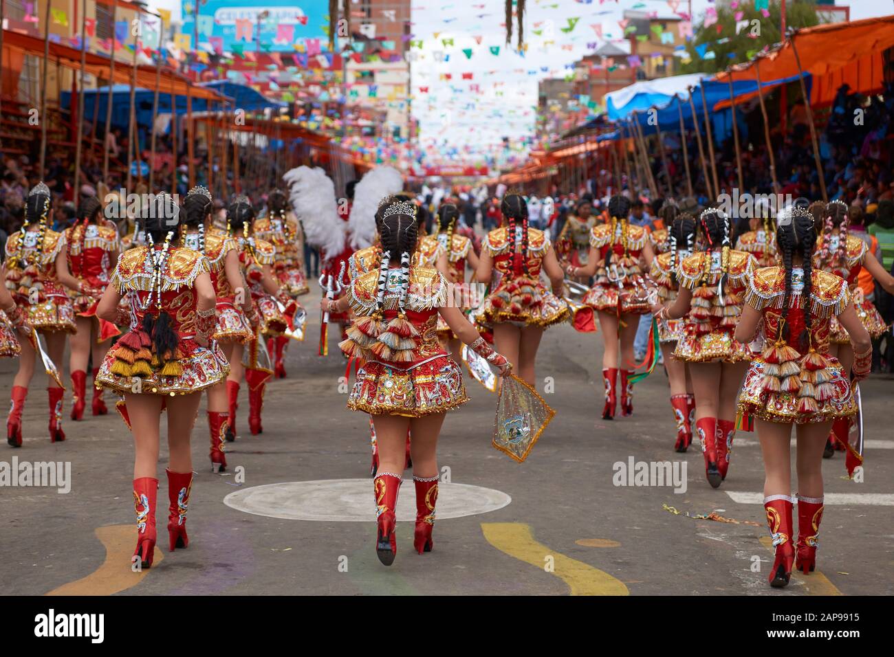 Diablada dancers in ornate costumes parade through the mining city of ...