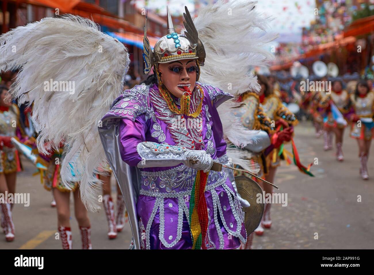Diablada dancers in ornate costumes parade through the mining city of ...