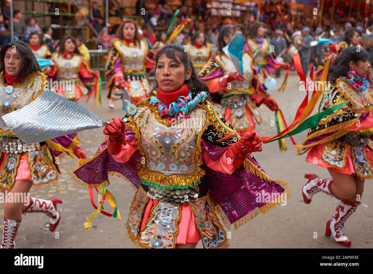 Diablada dancers in ornate costumes parade through the mining city of ...