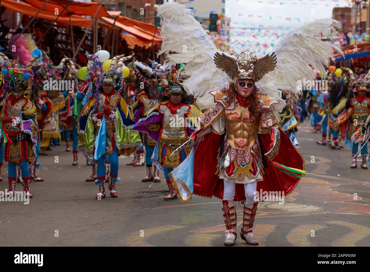 Diablada dancers in ornate costumes parade through the mining city of ...