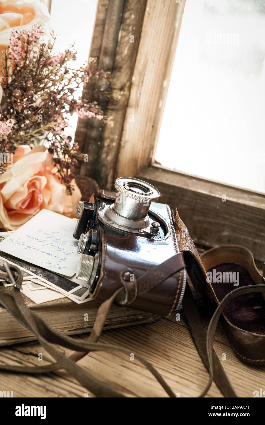 vintage still life with camera Stock Photo - Alamy