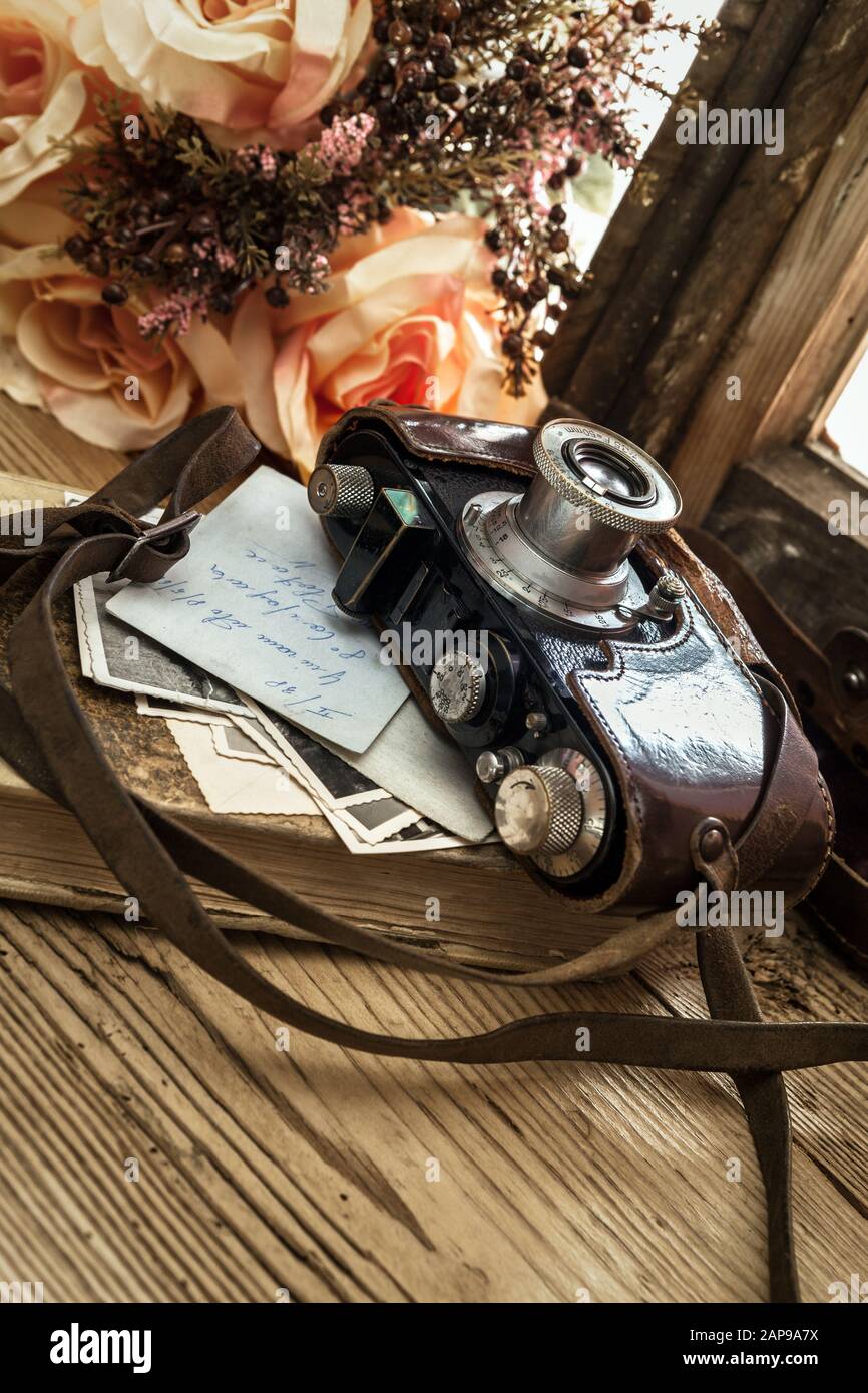 vintage still life with camera Stock Photo - Alamy
