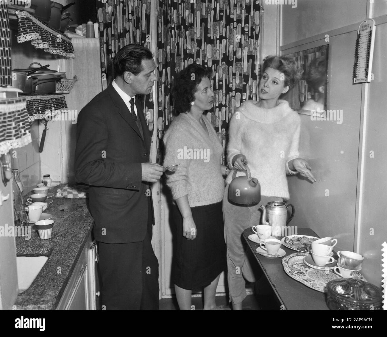 Cooking home in kitchen Black and White Stock Photos & Images - Alamy