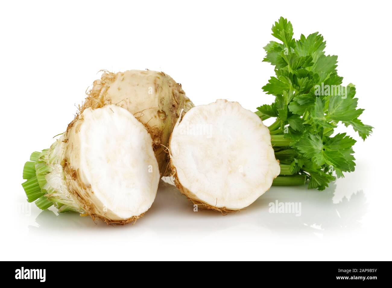 Fresh celeriac with slices isolated on white background Stock Photo - Alamy