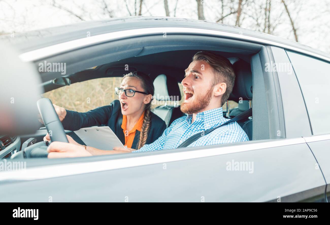 Dangerous situation in the car during driving instruction or test Stock ...