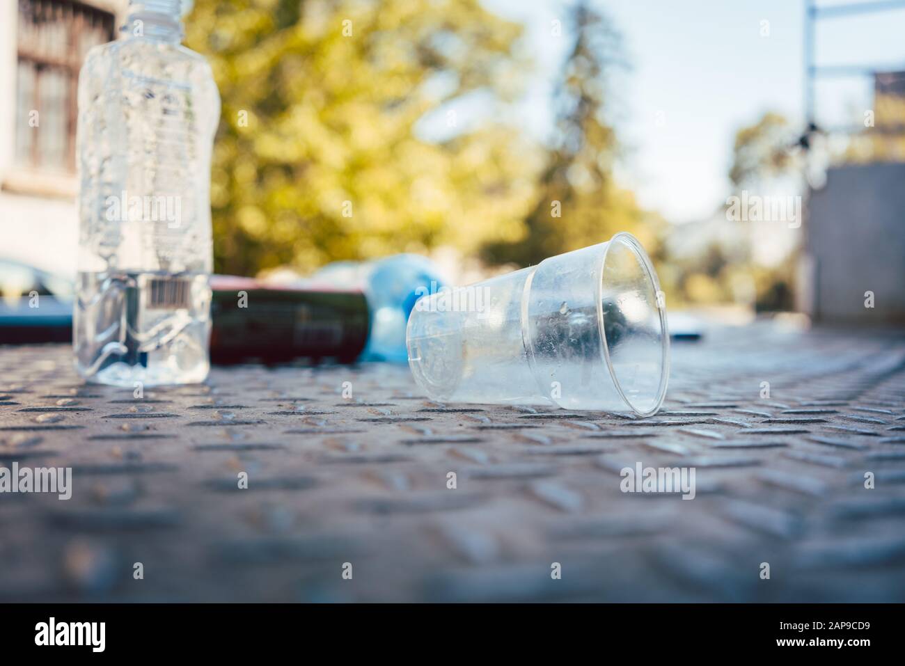 Plastic waste on the floor in aftermath of a party Stock Photo - Alamy