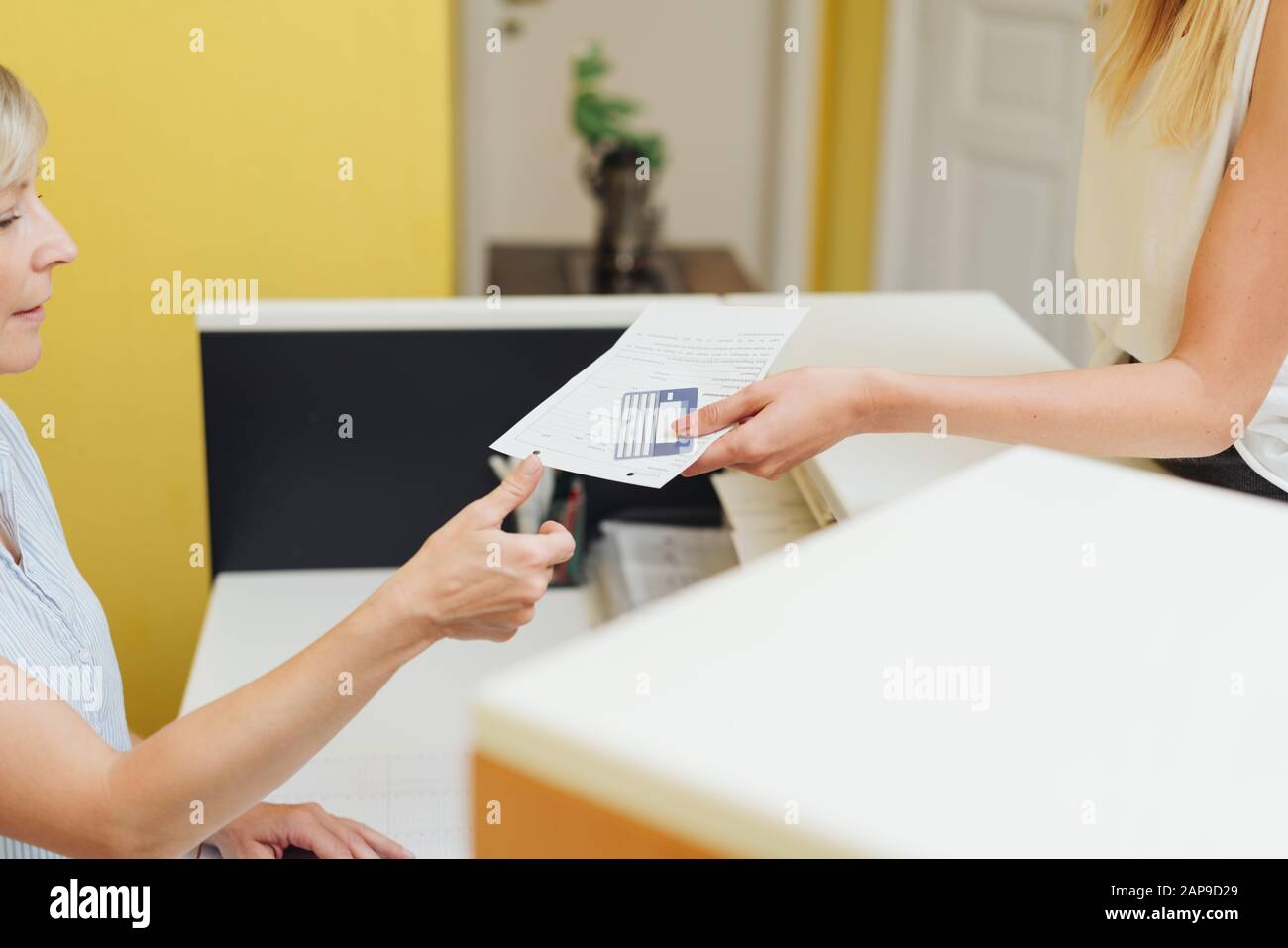 Handing over office hi-res stock photography and images - Alamy