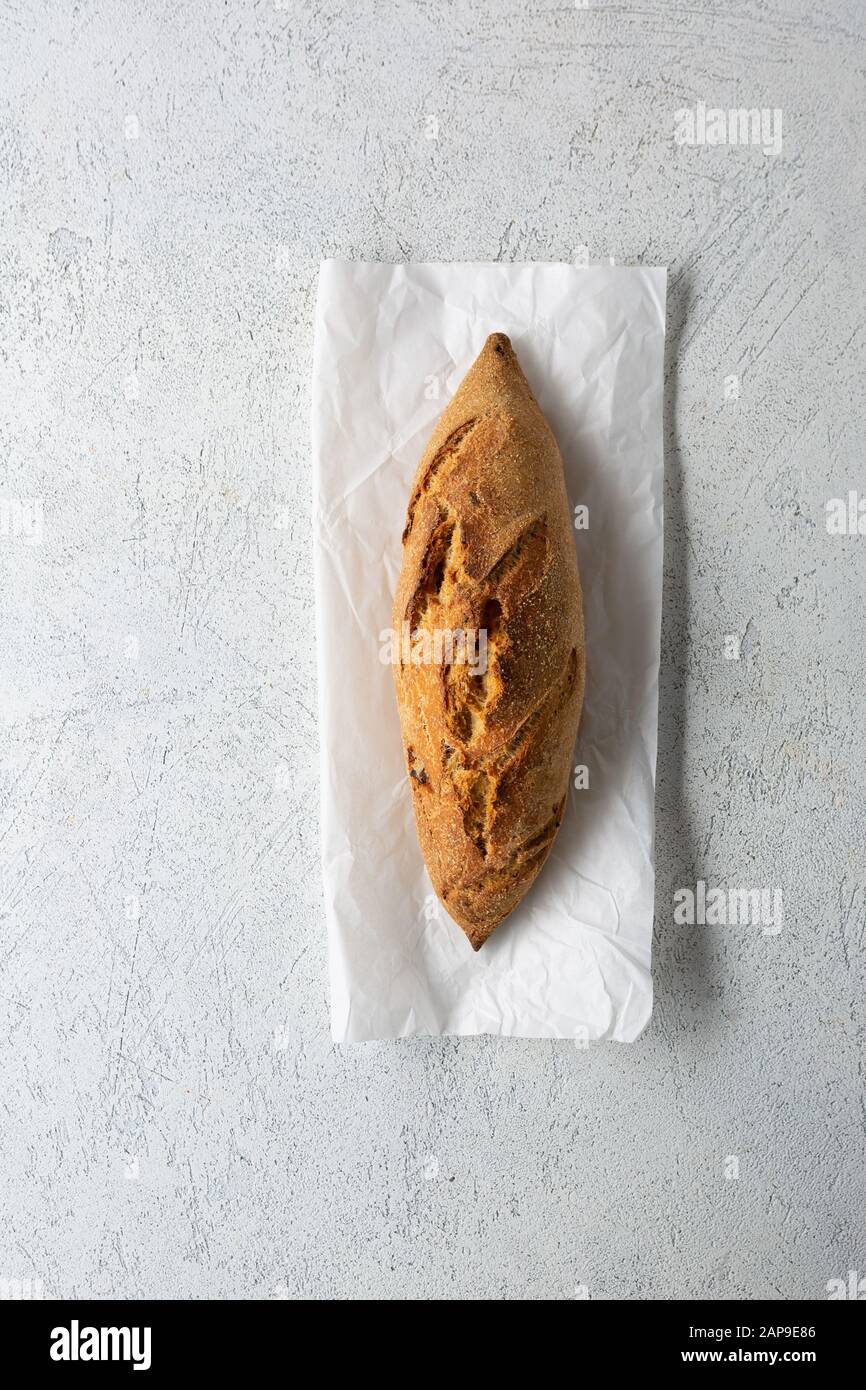 Fresh bread top view on white Stock Photo - Alamy