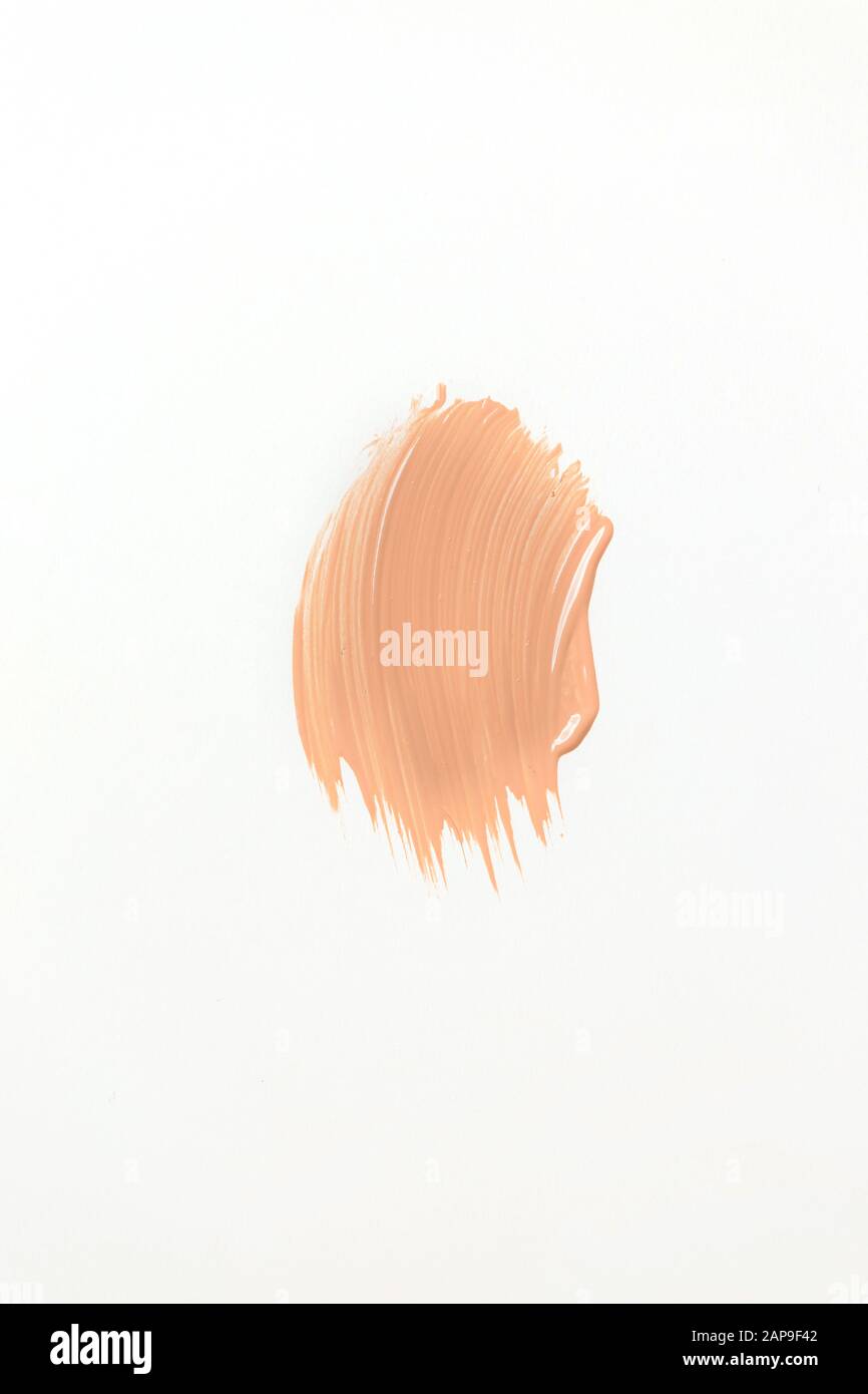Beige skin tone smudge on isolated white background, cream texture ...