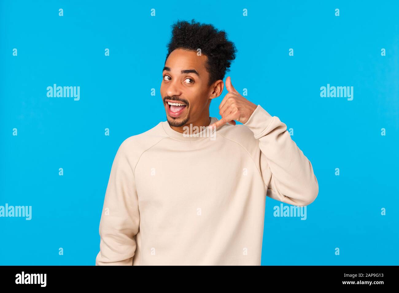 Hello whos calling. Funny attractive and cheerful hipster african ...