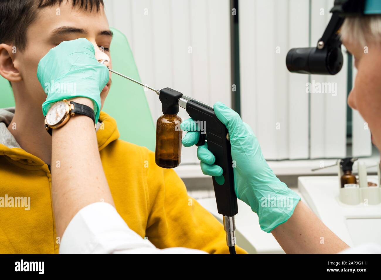 Preventive examination of a teenage boy in a medical facility Stock ...