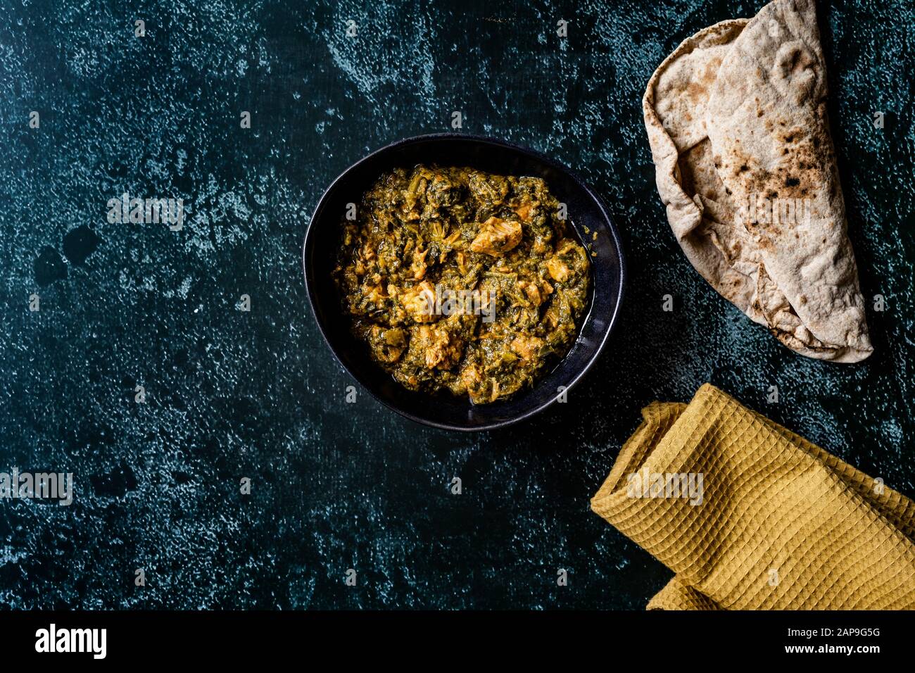 Indian Dish Spinach Lamb Palak with Chappati Flat Bread. Traditional ...