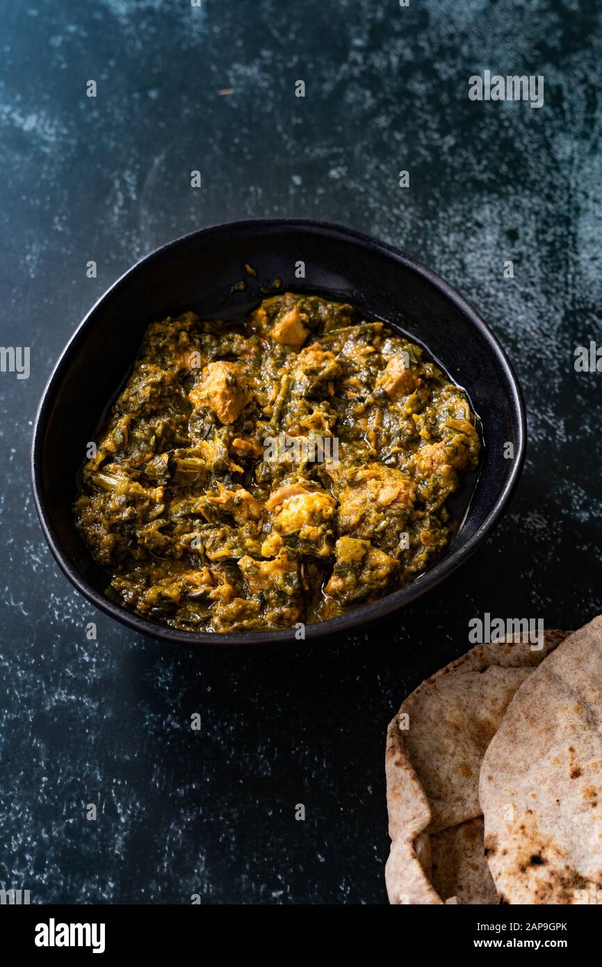 Indian Dish Spinach Lamb Palak with Chappati Flat Bread. Traditional ...