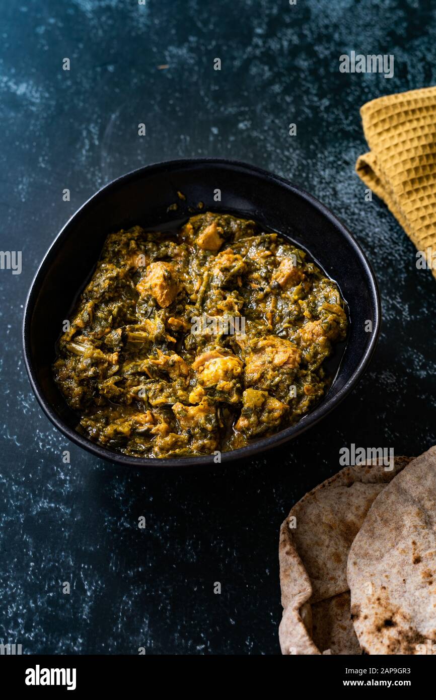 Indian Dish Spinach Lamb Palak with Chappati Flat Bread. Traditional ...