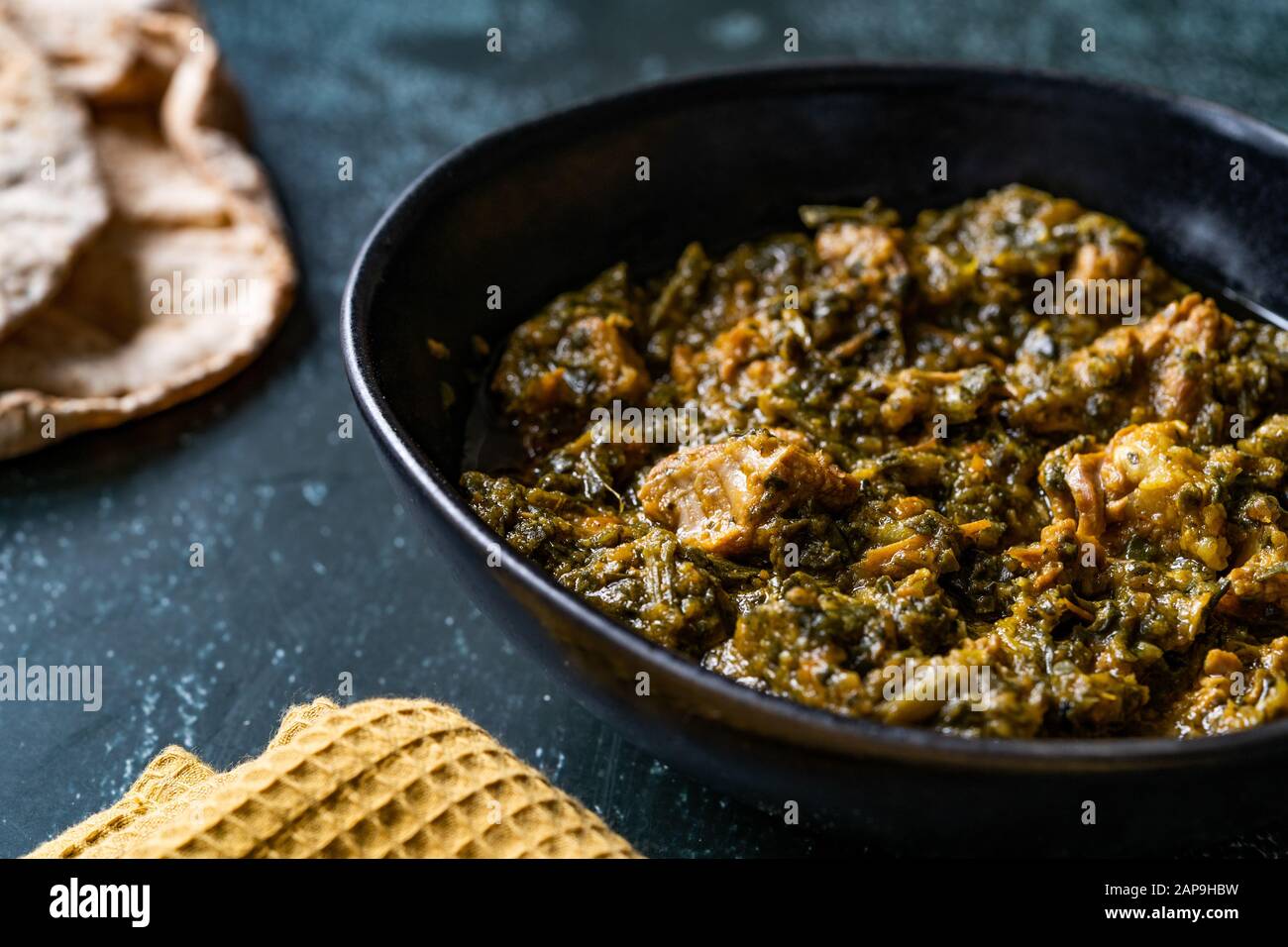 Indian Dish Spinach Lamb Palak with Chappati Flat Bread. Traditional ...