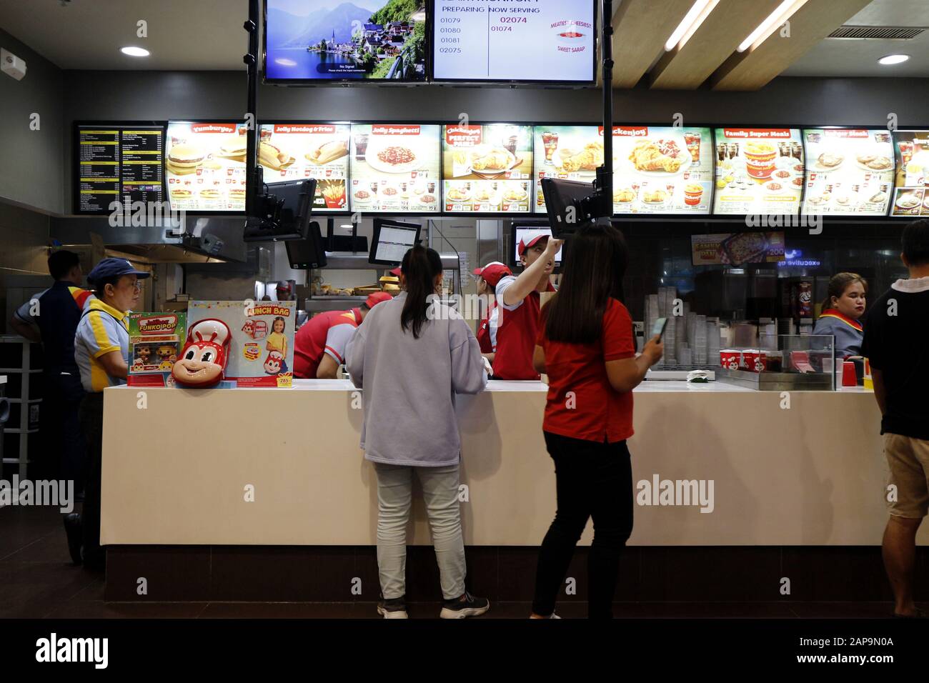 Restaurant fast food counter asian woman hi-res stock photography and ...