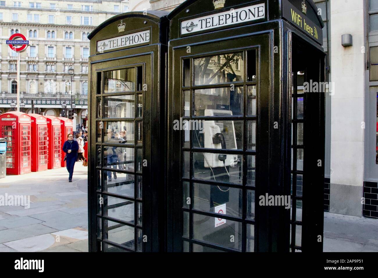 Red & Black Telephone boxes, London, England Stock Photo - Alamy