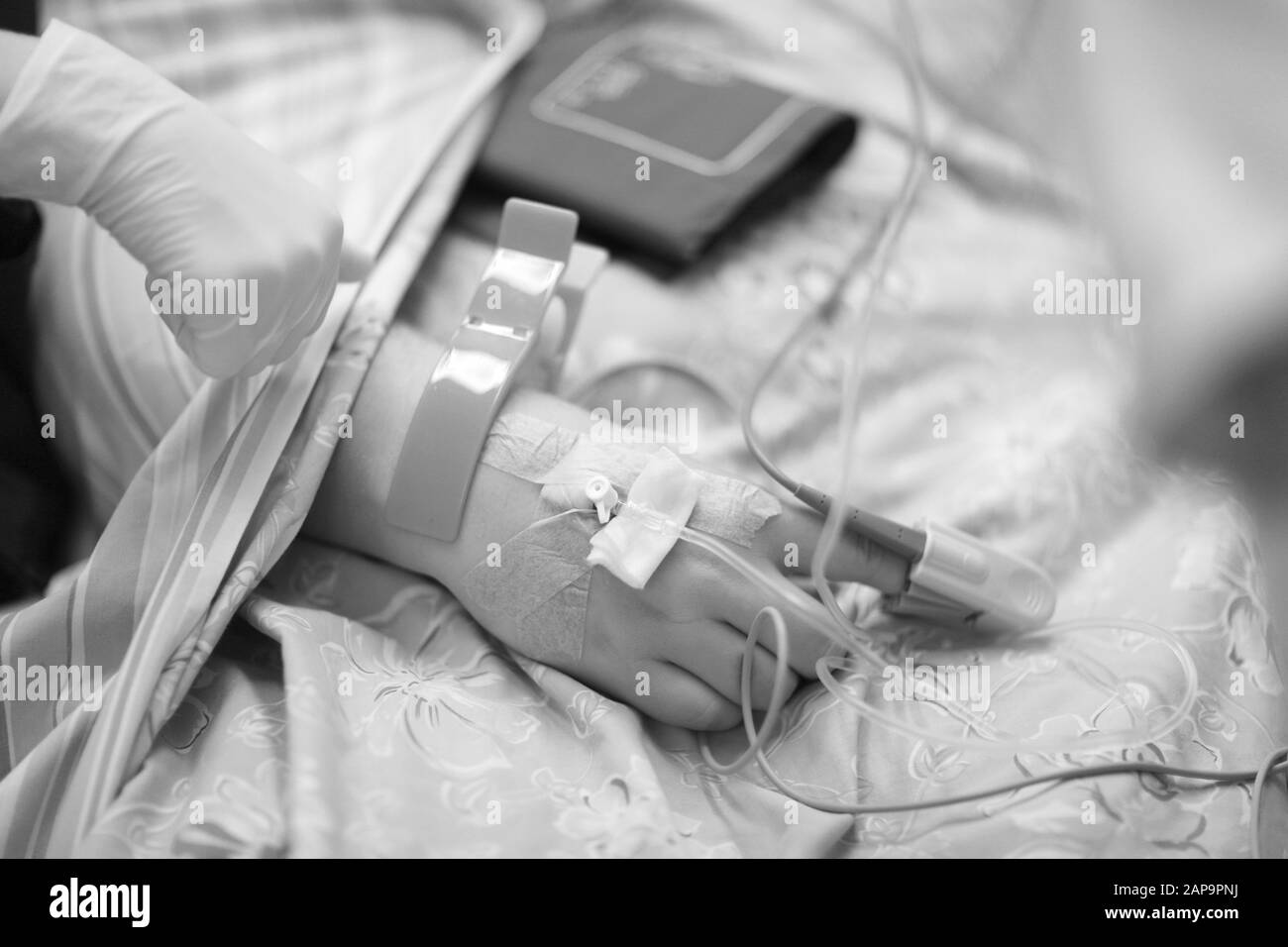 The patient's hand in the clinic with a catheter for intravenous ...