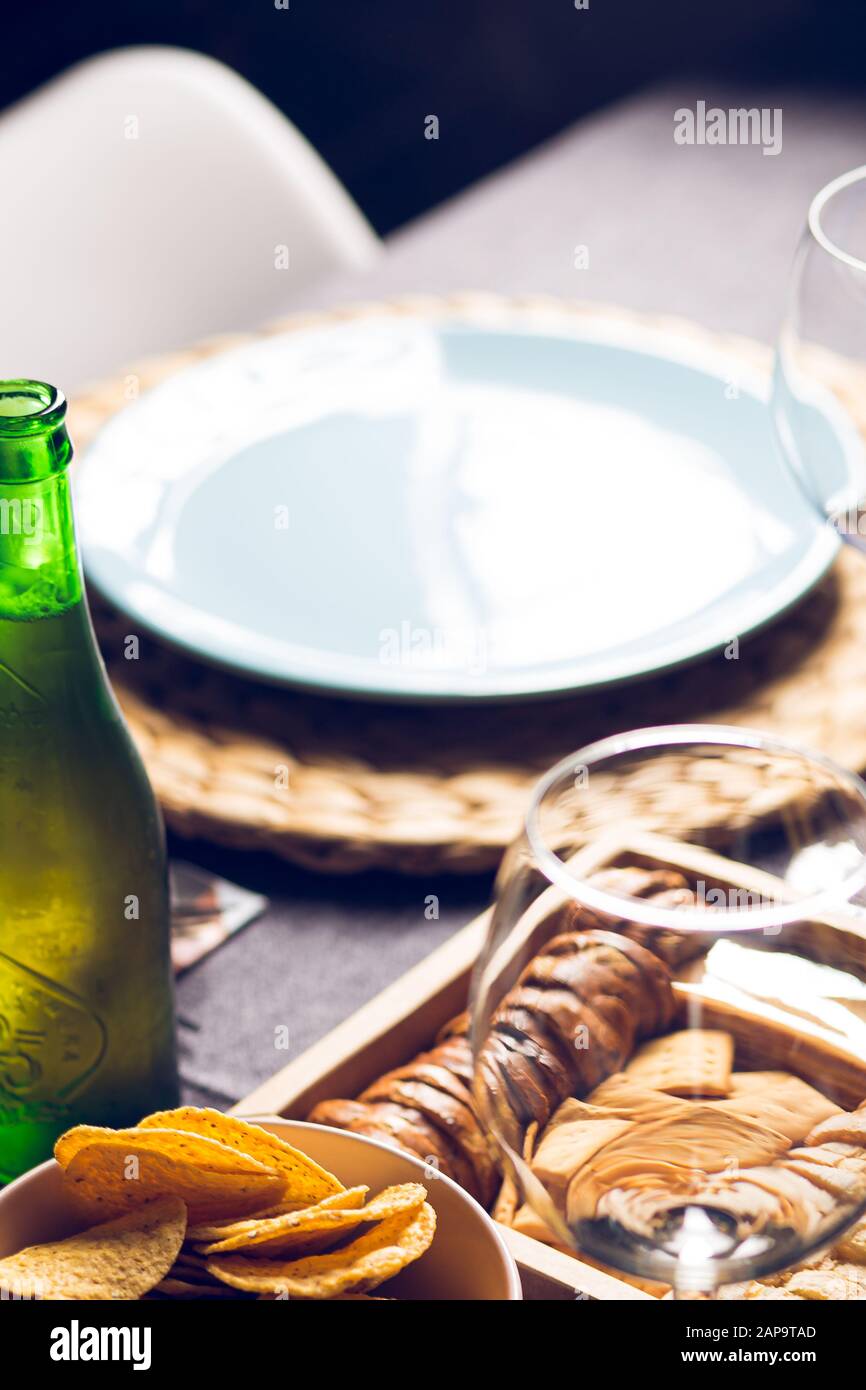 Empty blue plate on a ready served food dining table Stock Photo - Alamy