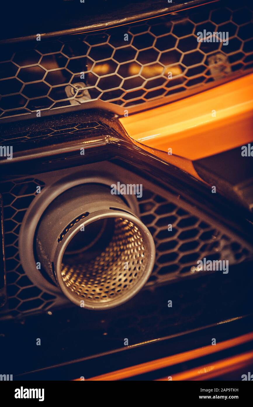 Close up horizontal shot of a sport car exhaust pipe Stock Photo - Alamy