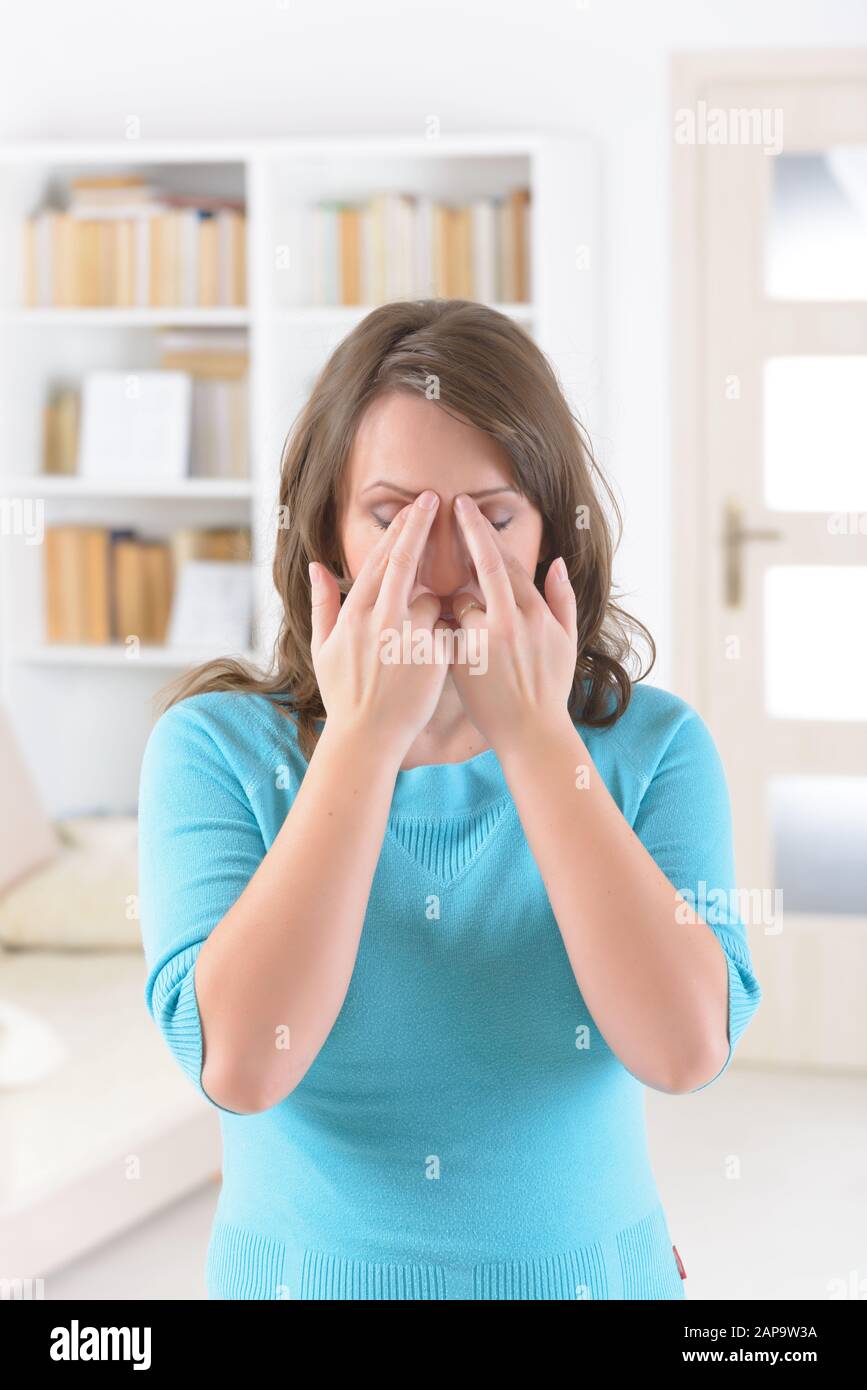 Woman doing EFT on the side of eye point. Emotional Freedom Techniques ...