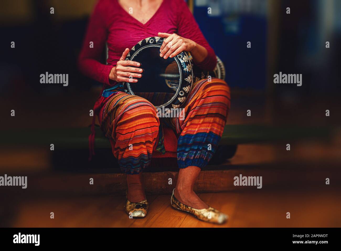 Young lady drummer with her djembe drum Stock Photo - Alamy