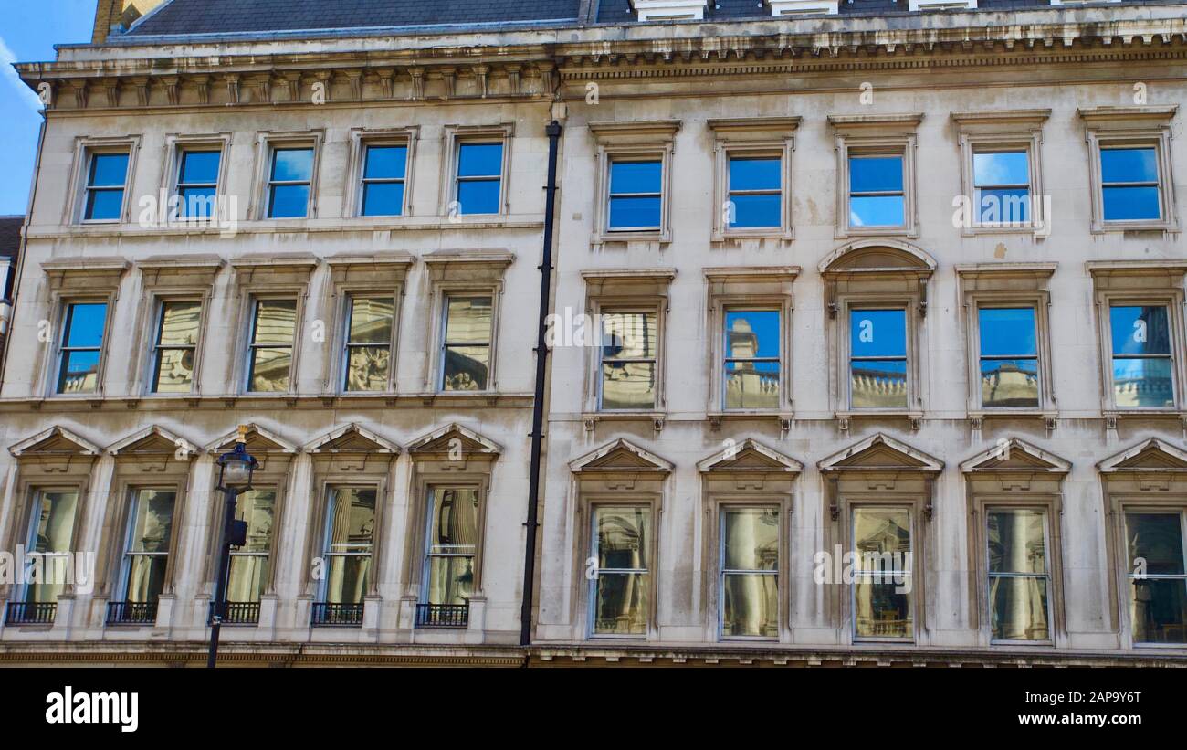 Reflection off glass window, London, England Stock Photo - Alamy