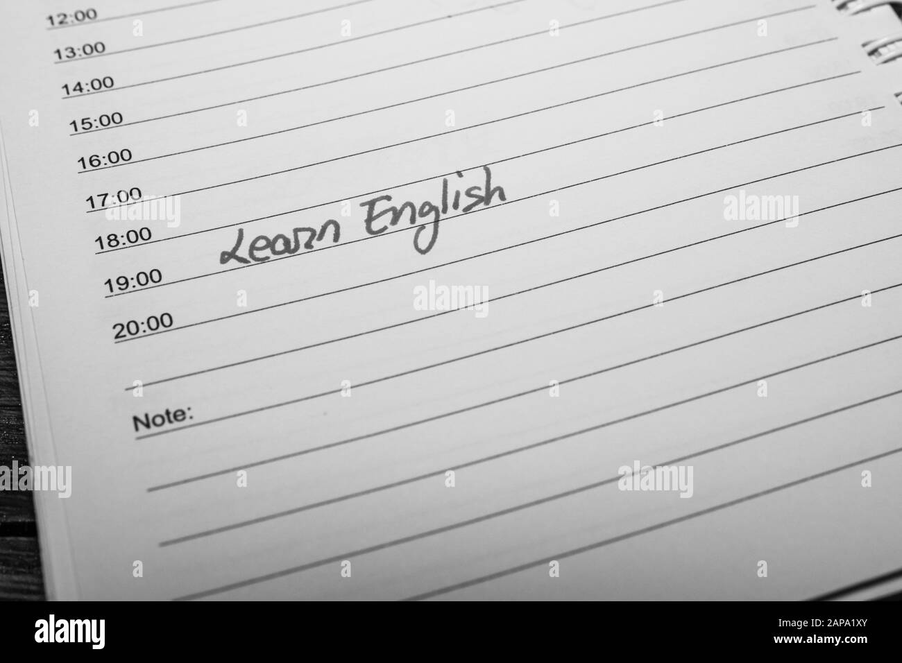 Learn English, handwriting text on page of office agenda. Copy space ...