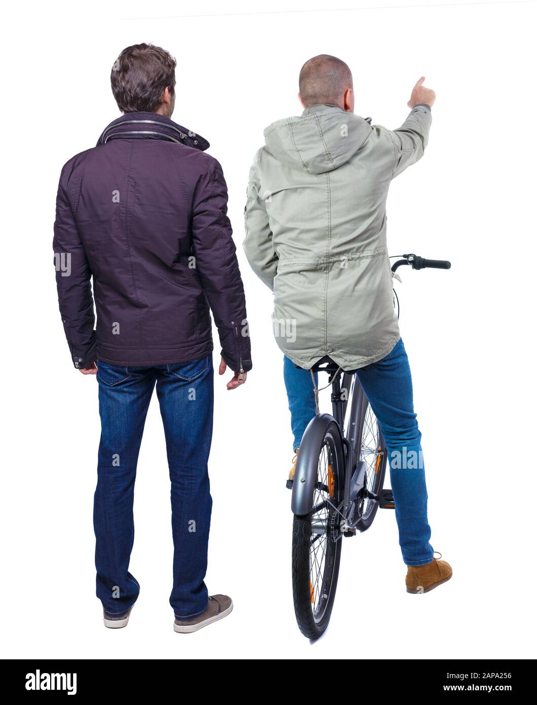 Back view of two man on a bicycle in winter jacket. Rear view people ...