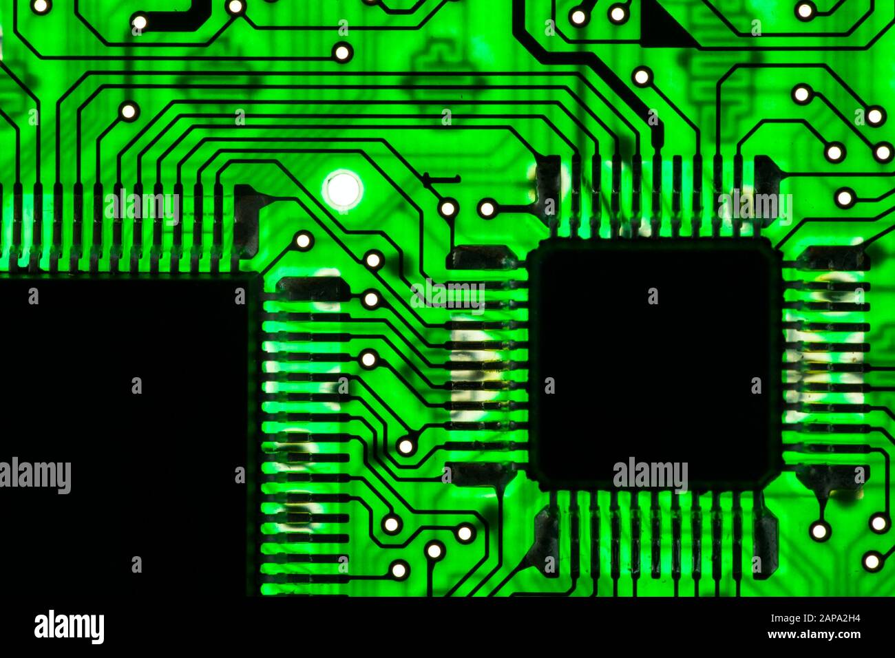Green transparent circuit board with microchips Stock Photo - Alamy