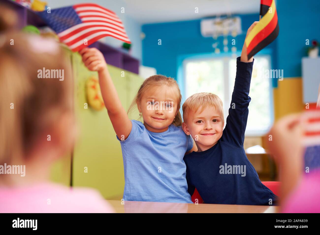 Portrait of two children learning languages in the classroom Stock ...