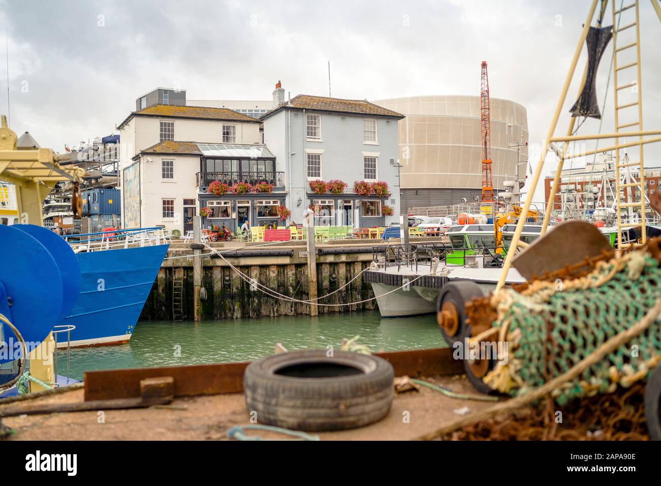 Old architecture and fisherman ships in historical dockyards of ...