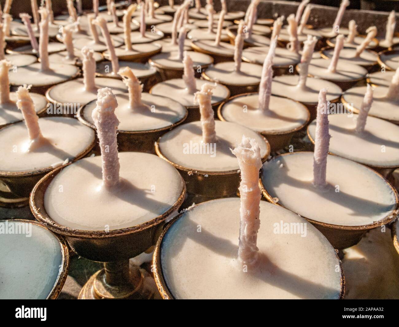 Production of tibetan butter lamps, later used in a temple Stock Photo ...