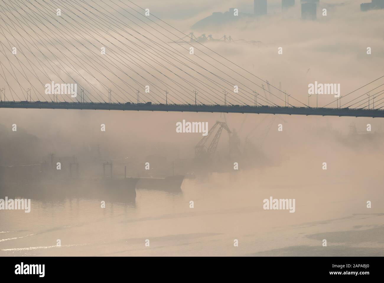 Cityscape daylight view. Fog over the city Stock Photo - Alamy