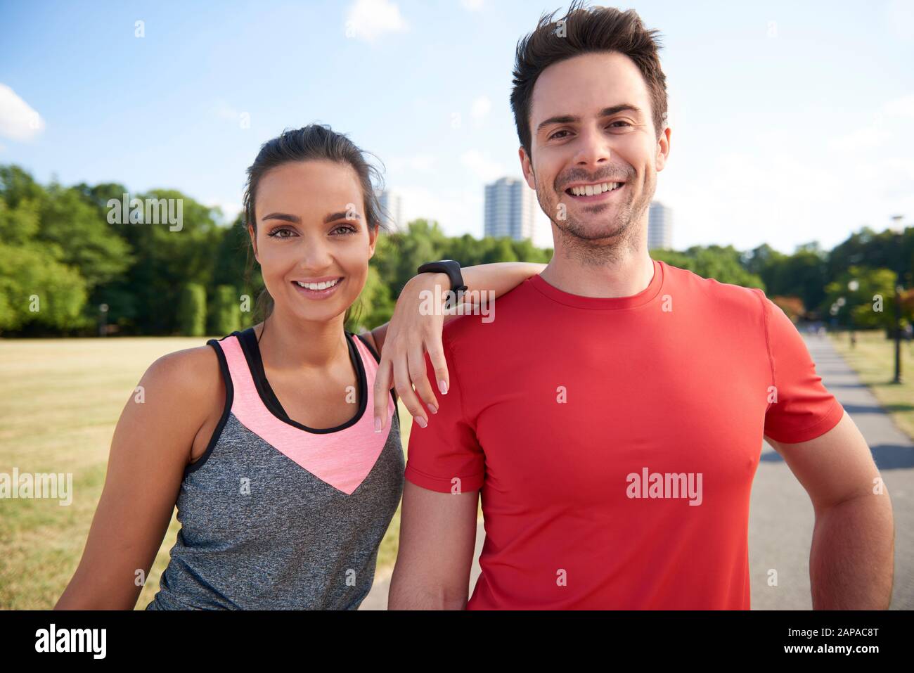 Portrait of smiling couple after hard workout Stock Photo - Alamy