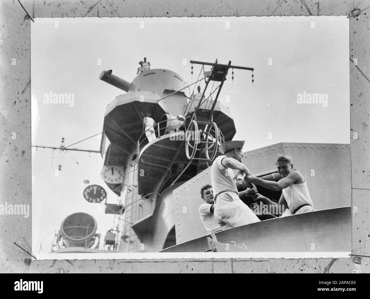 Crew members of a Dutch cruiser [presumably Hr. Ms. Dan. De Ruyter] at ...