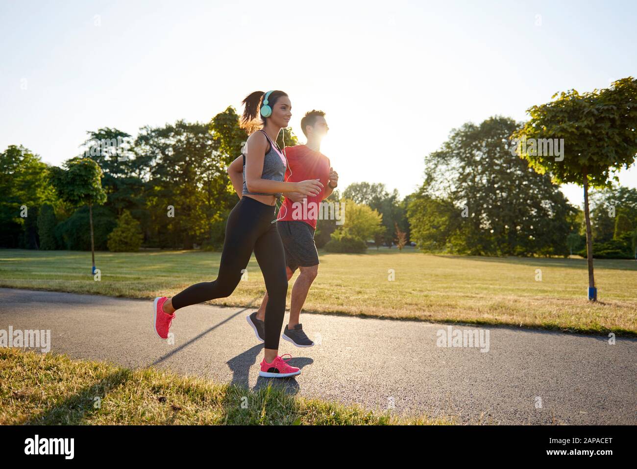 Running with partner is more pleasure Stock Photo - Alamy