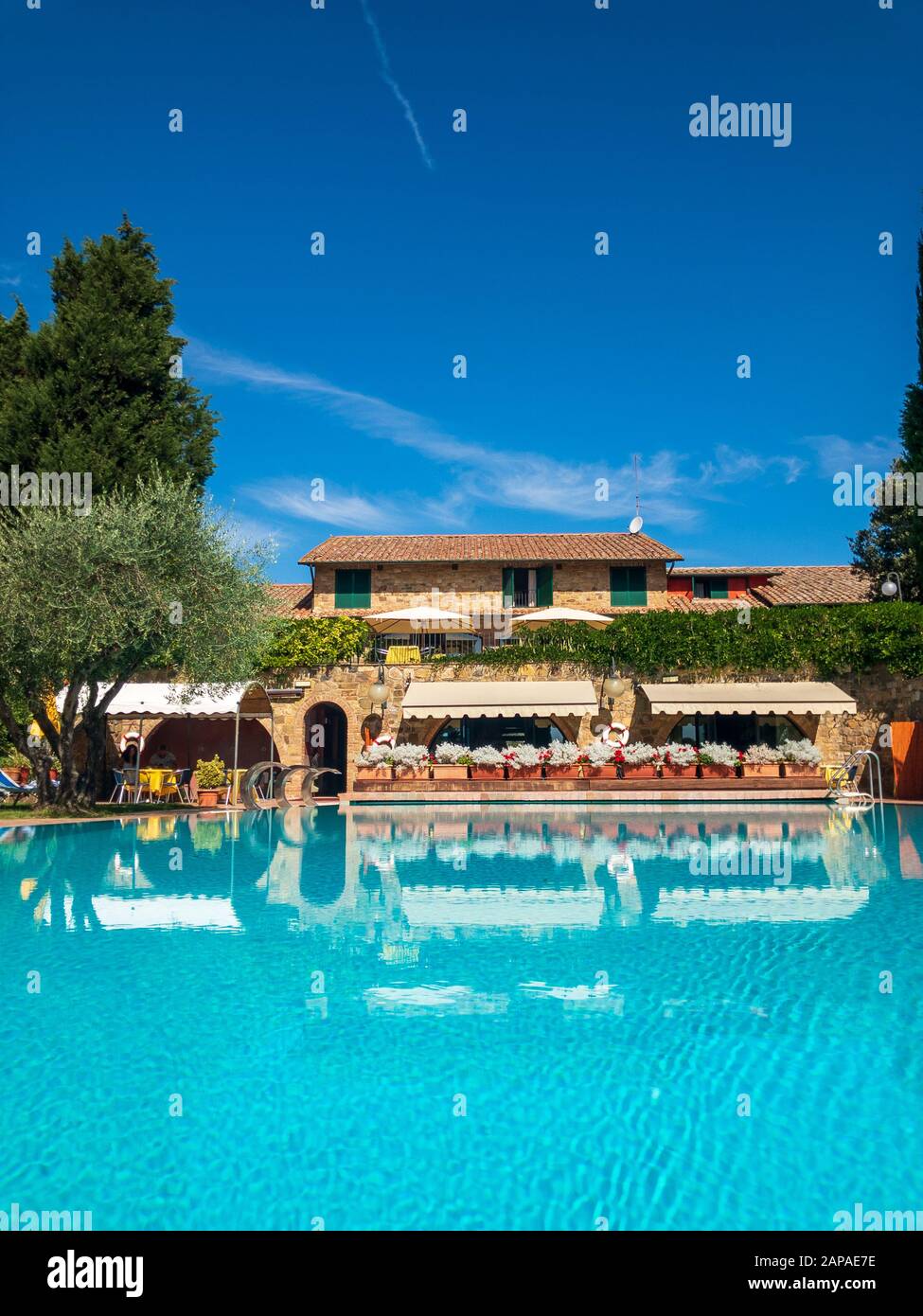 Swimming pool in the hotel, blue water Stock Photo - Alamy