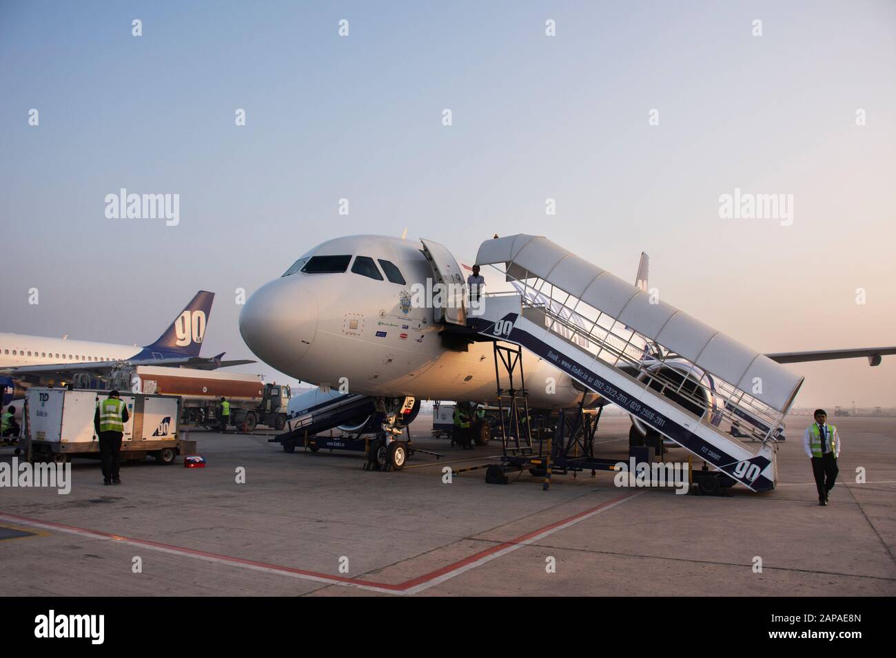 NEW DELHI, INDIA - MARCH 19 : Aircraft and indian people prepare to ...