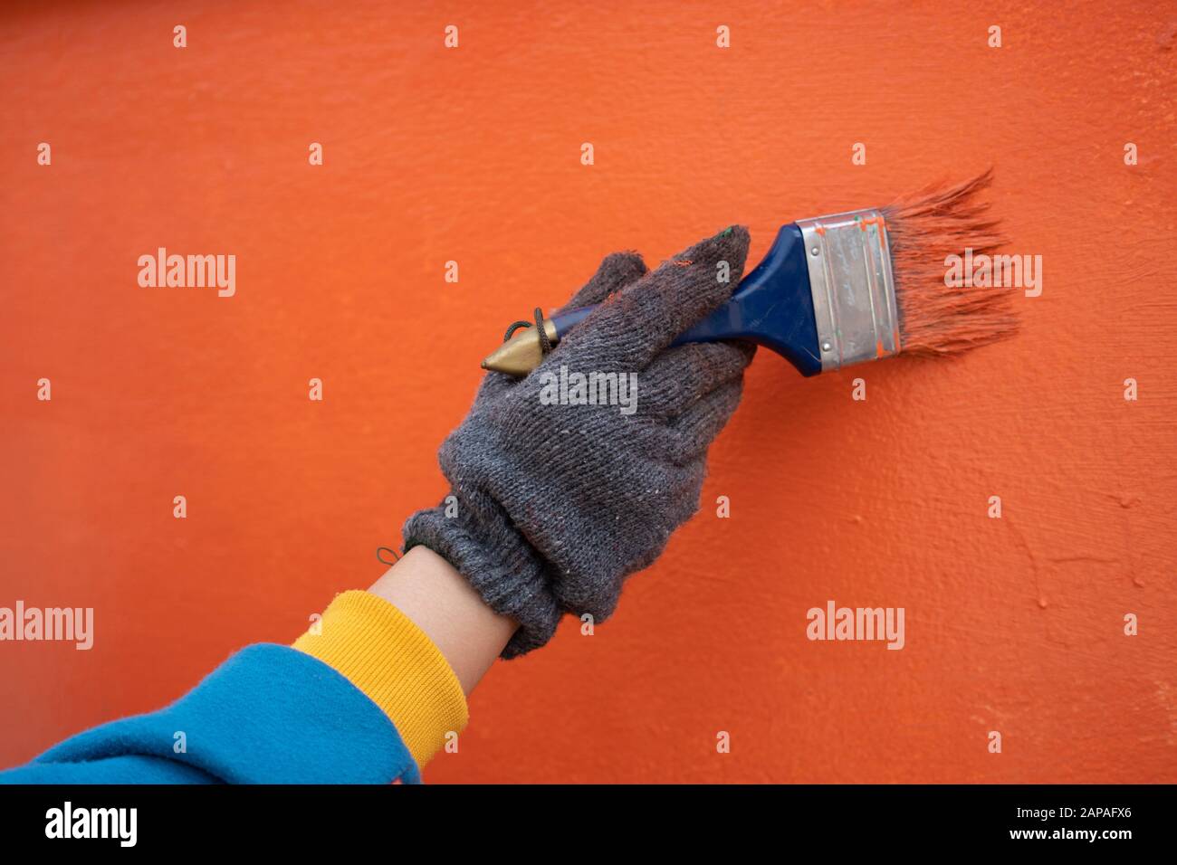 Painter labor Paint the wall using paint plots and rollers. Concepts of ...