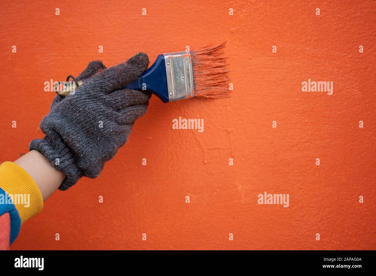 Painter labor Paint the wall using paint plots and rollers. Concepts of ...