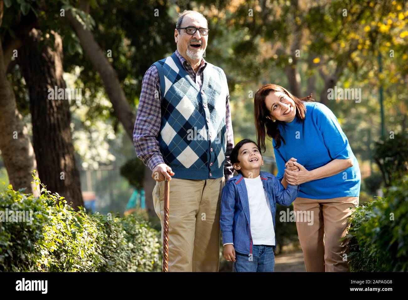 Happy grandparents spending leisure time with little grandson Stock ...