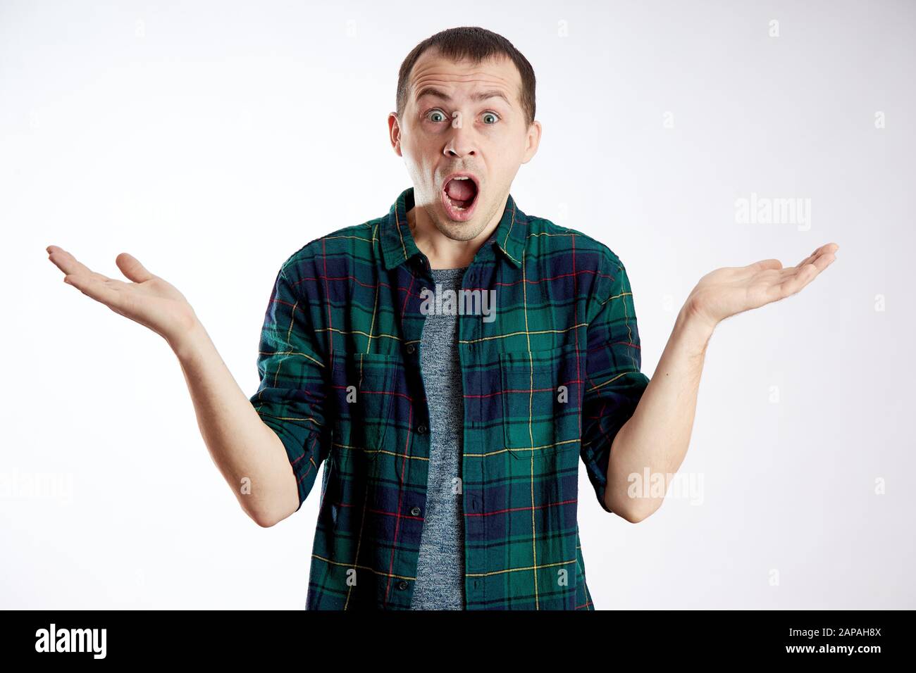 Guy looks surprised, confused. Unexpected emotions, bewilderment and ...