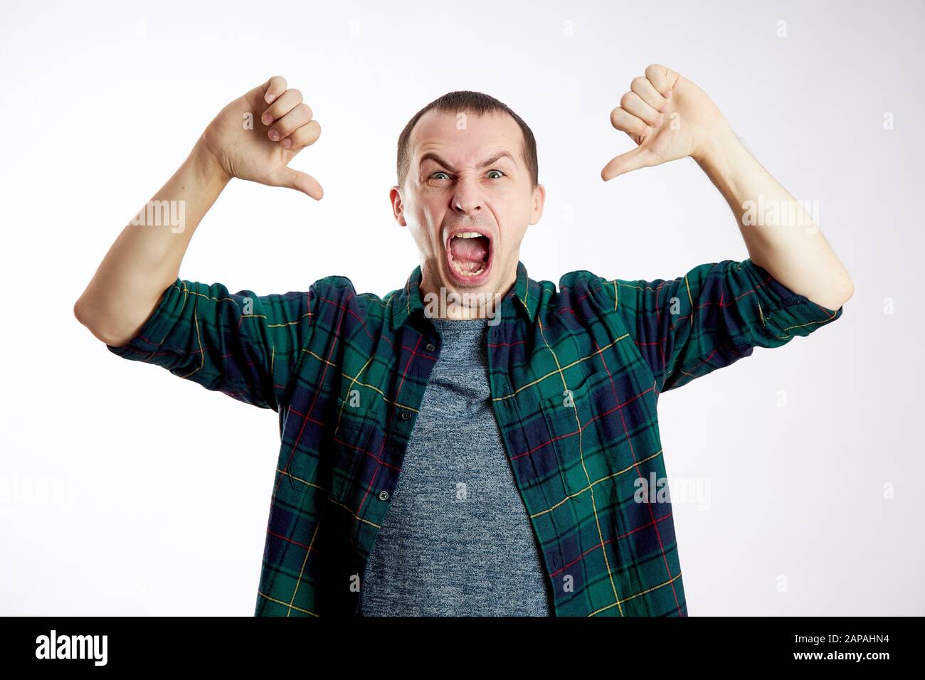 Success is joy and luck. Man is happy, victory. Happy face of the guy ...