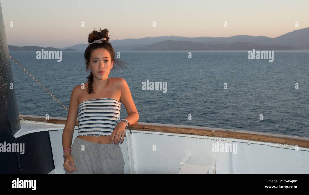 Leaning against railing hi-res stock photography and images - Alamy