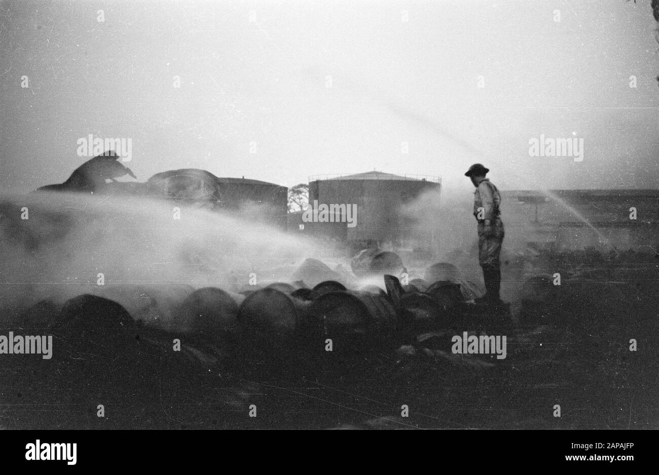 [Fire brigade fighting a fire on a factory site] Date: april 1947 ...