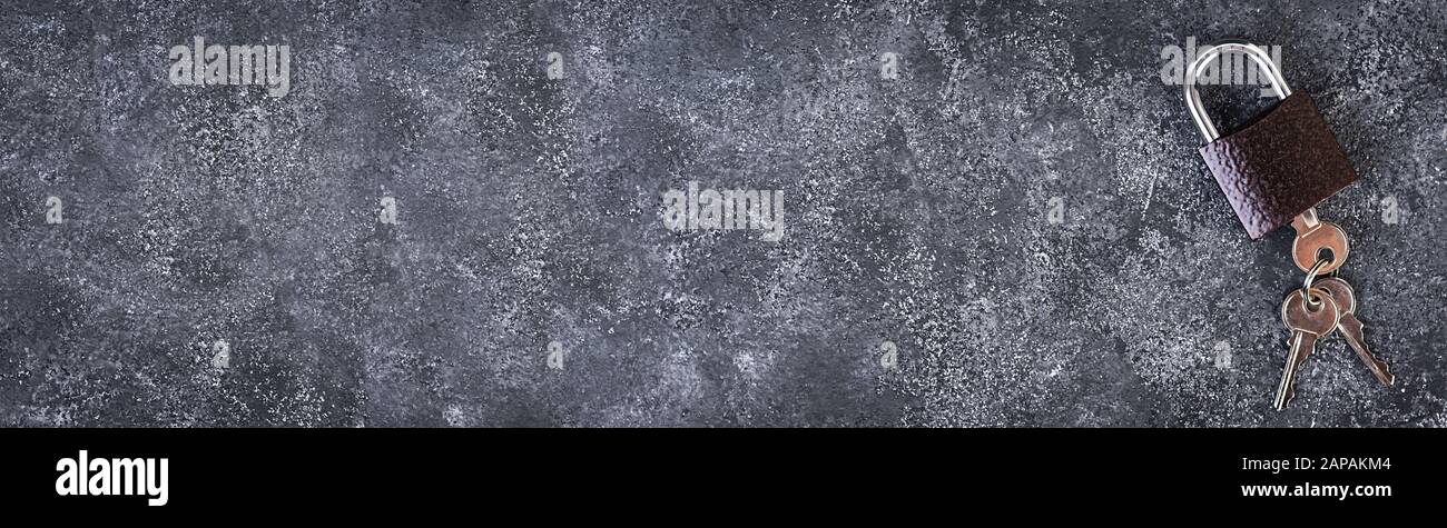 Iron lock with keys on grey background. Top view. Banner Stock Photo ...