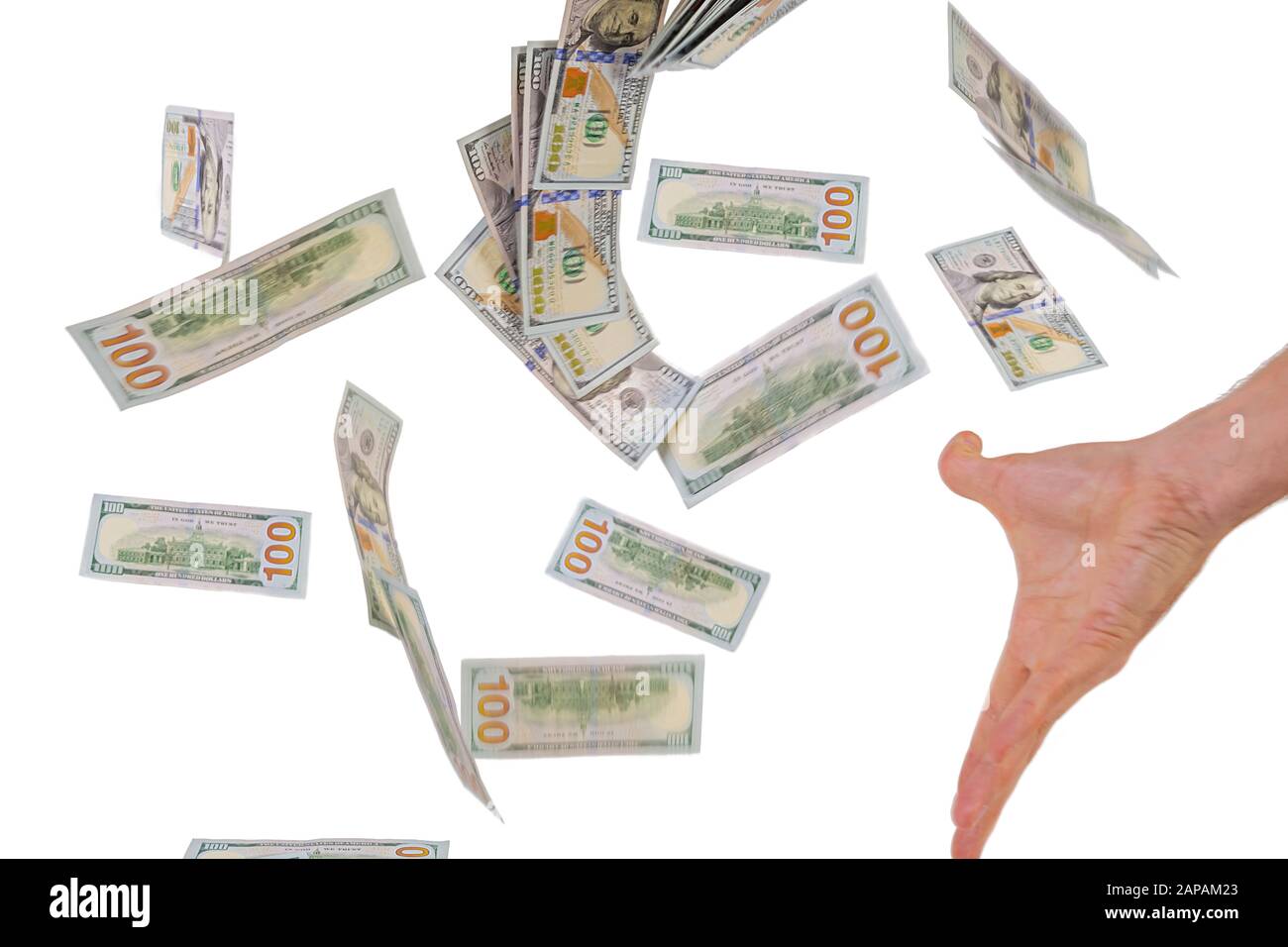 Business concept. Hand with flying money isolated on white background ...